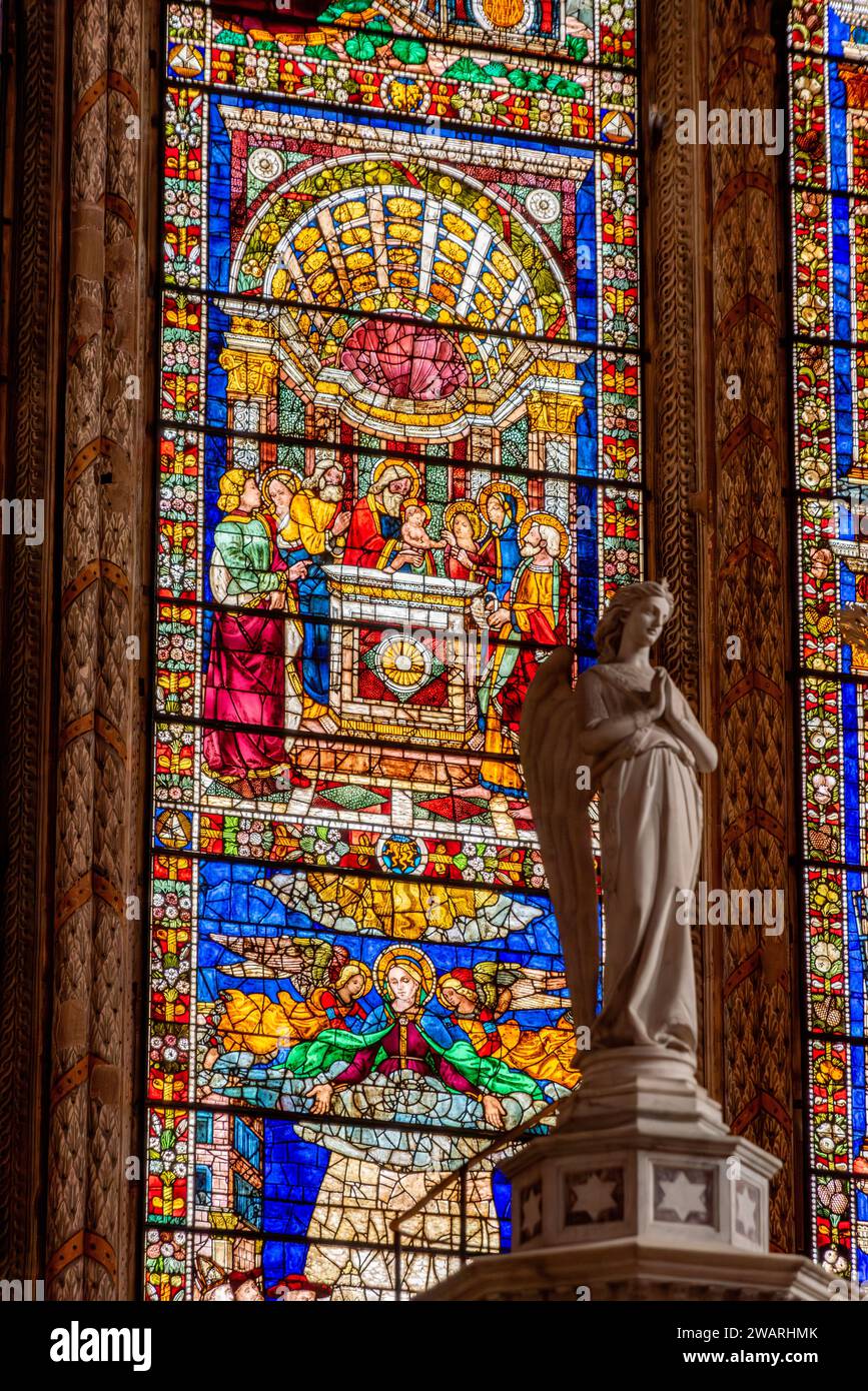 FLORENCE, ITALY - SEPTEMBER 21, 2023 - Colorful stained glass windows ...