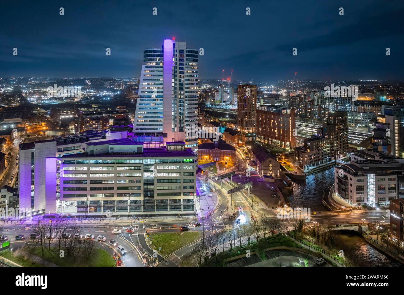 Leeds, Yorkshire. Leeds city centre aerial photograph at night looking ...