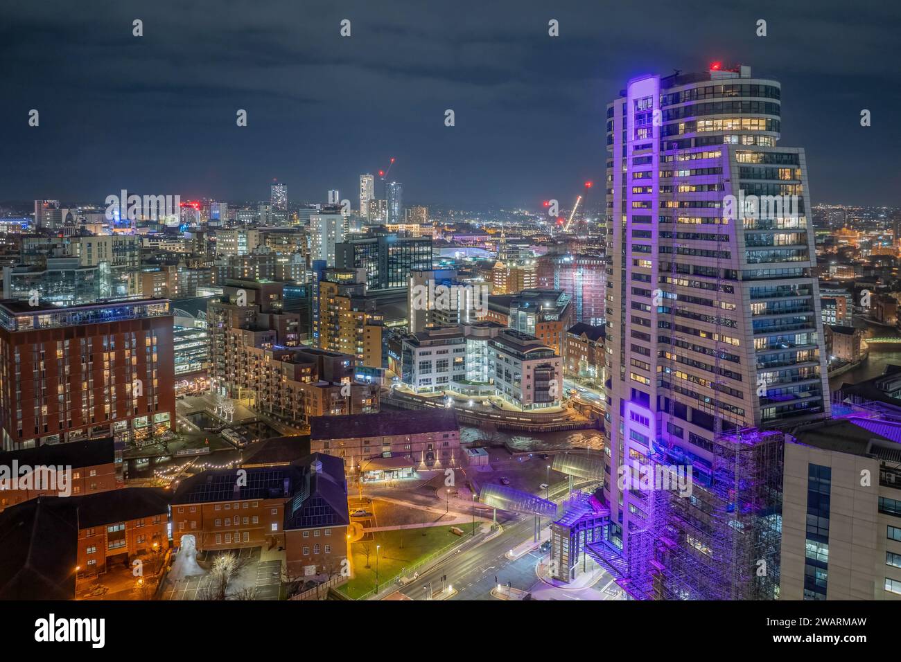 Leeds, Yorkshire. Leeds city centre aerial photograph at night looking ...