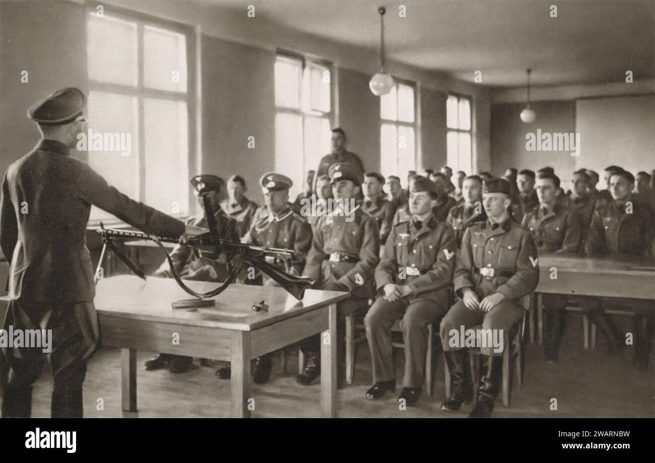 German recruits during their military training are shown receiving ...