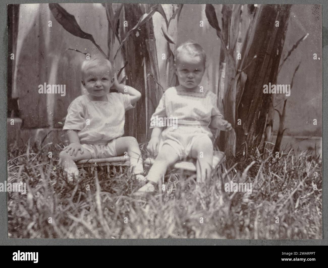 Klaas Kleiterp (right) and a child of the Eckhardt family in a garden ...
