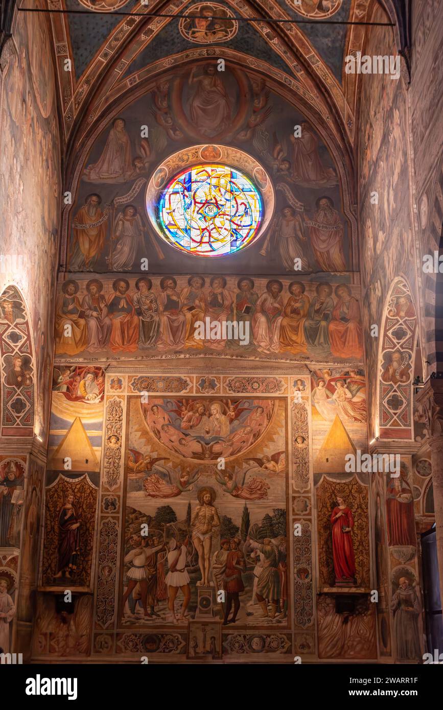 SAN GIMGNANO, ITALY - SEPTEMBER 20, 2023 - Colorful old frescoes at the ...