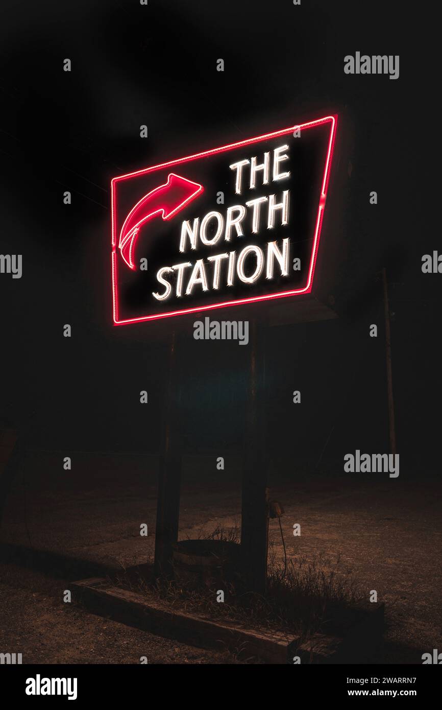 A vibrant nighttime photo of the illuminated North Station sign, with a ...