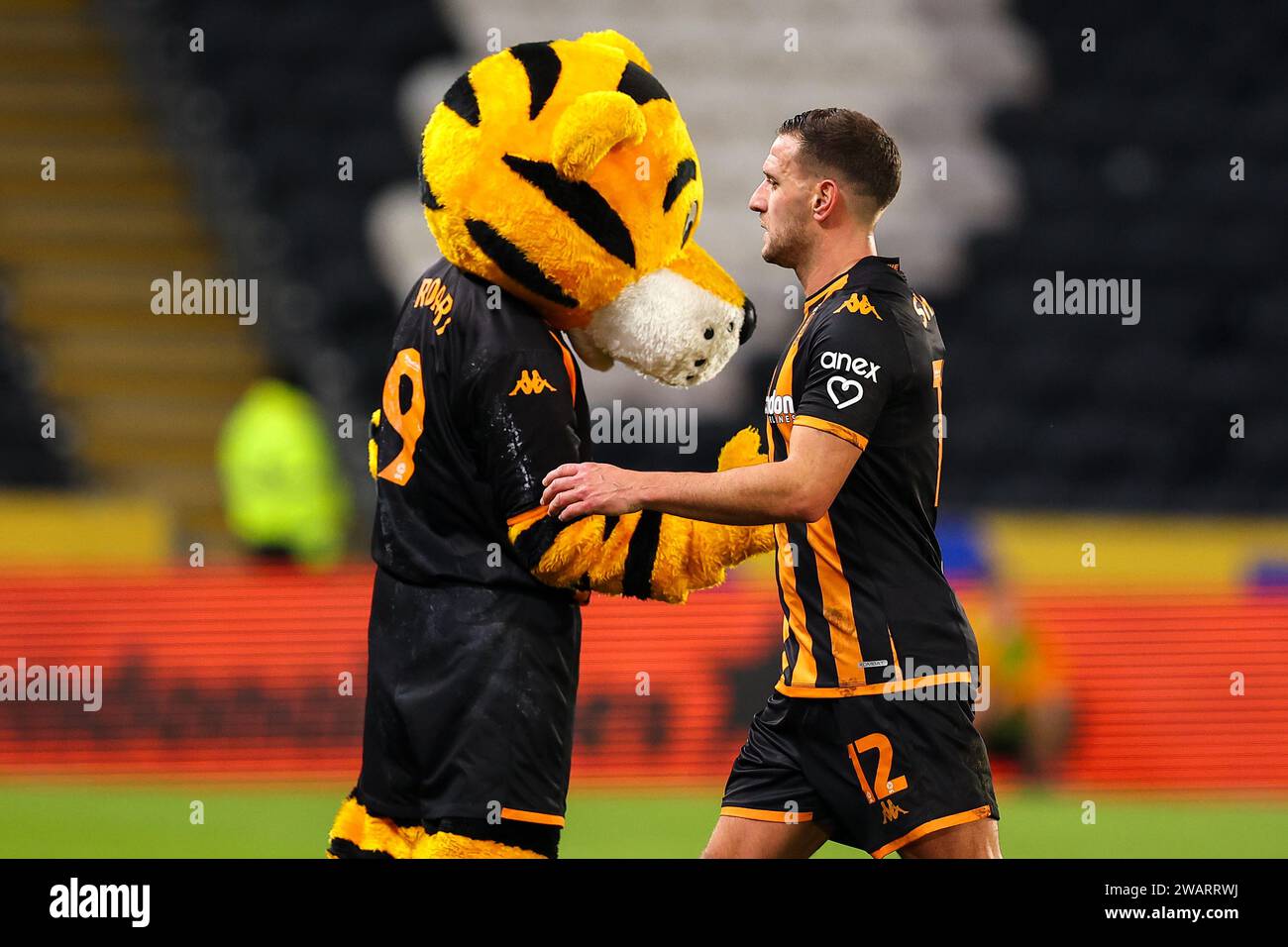 Billy Sharp of Hull City celebrates with Hull City mascot Roary after ...