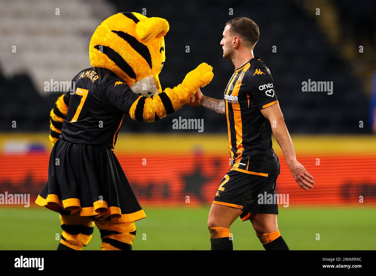 Billy Sharp of Hull City celebrates with Hull City mascot Amber after ...