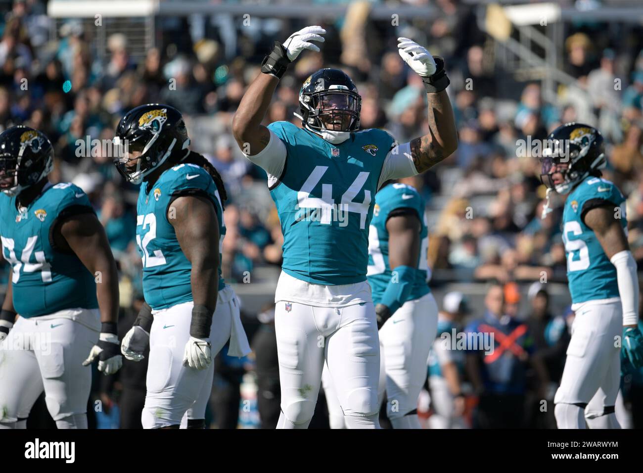 Jacksonville Jaguars linebacker Travon Walker (44) encourages fans in ...