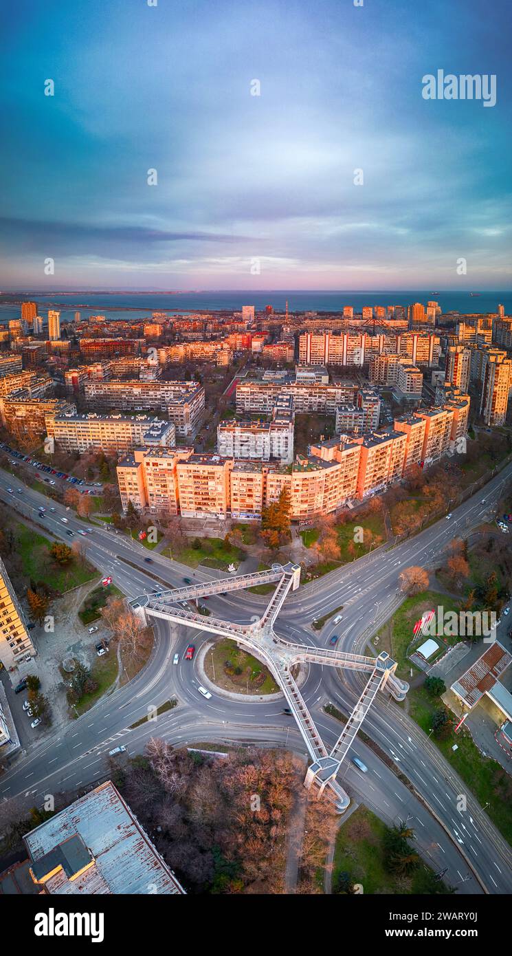 Panorama view of the road with a circular motion and a flower bed at ...