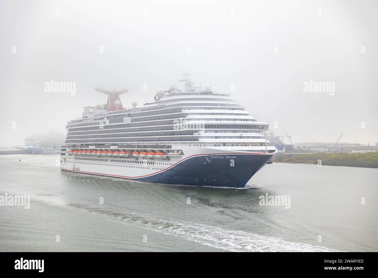 A large cruise ship sailing across a beautiful misty sea Stock Photo ...