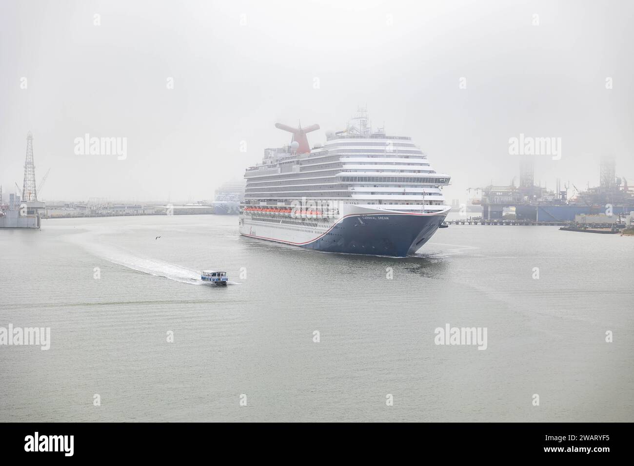A large cruise ship sailing across a beautiful misty sea Stock Photo ...