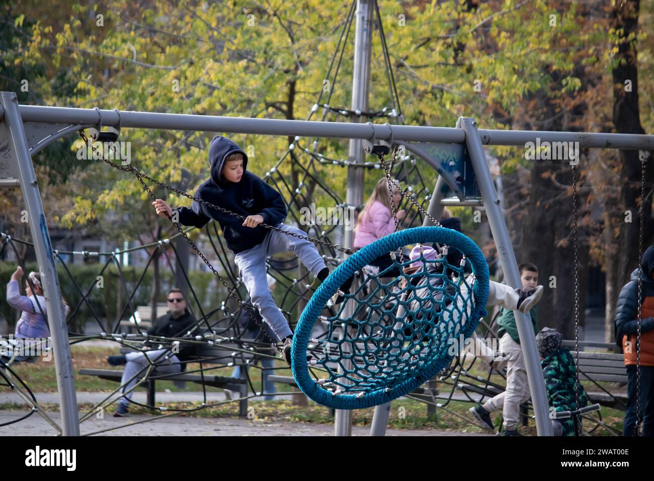Kids playing at public playground in public park in Belgrade, Tasmajdan ...