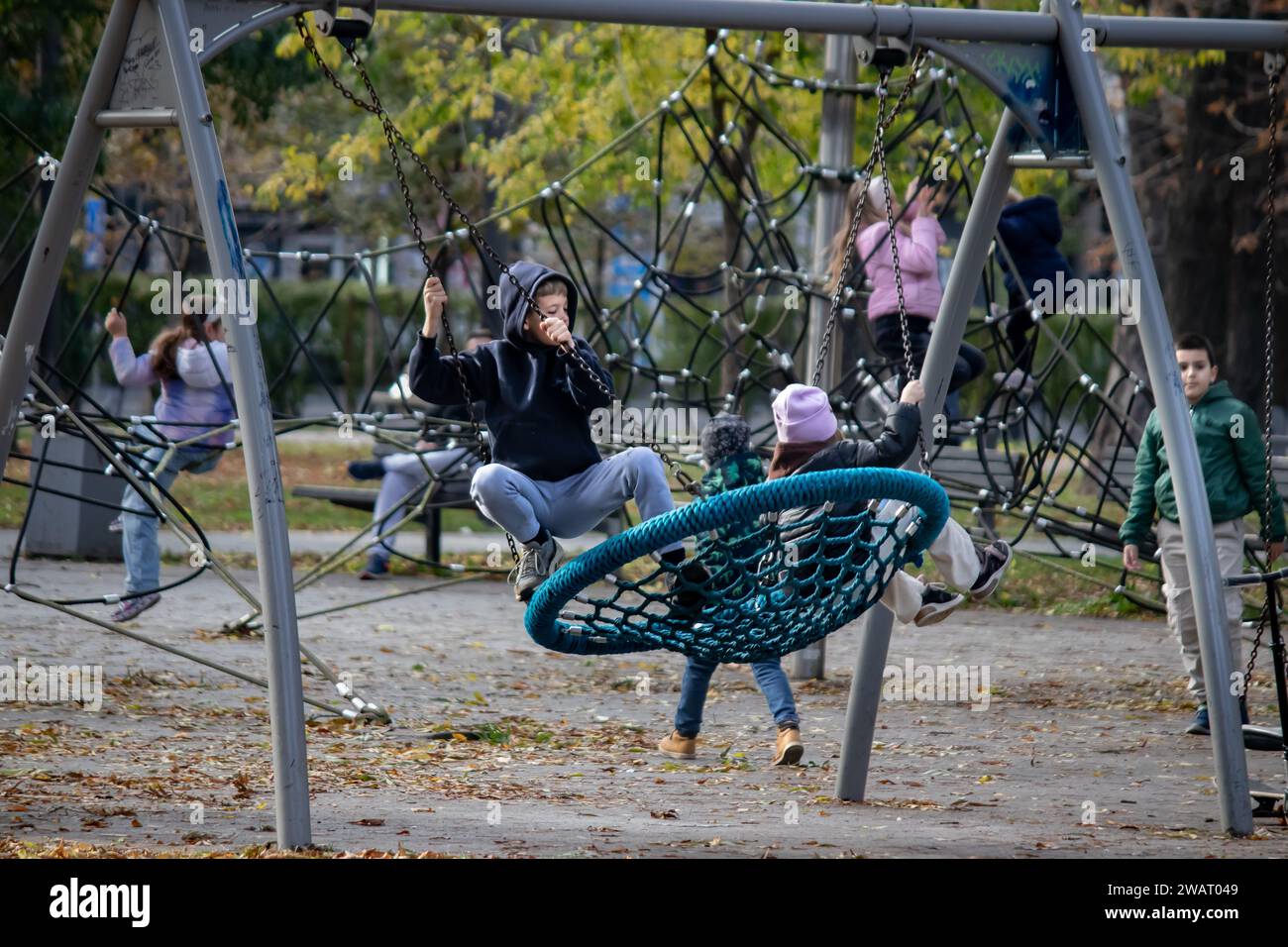 Kids playing at public playground in public park in Belgrade, Tasmajdan ...