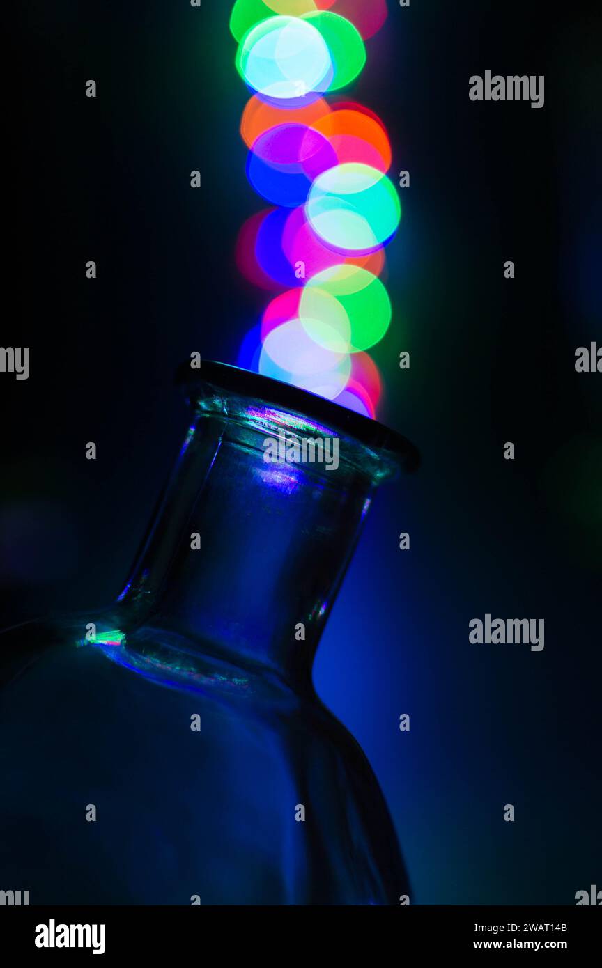 Empty bottle with bokeh lights Stock Photo - Alamy