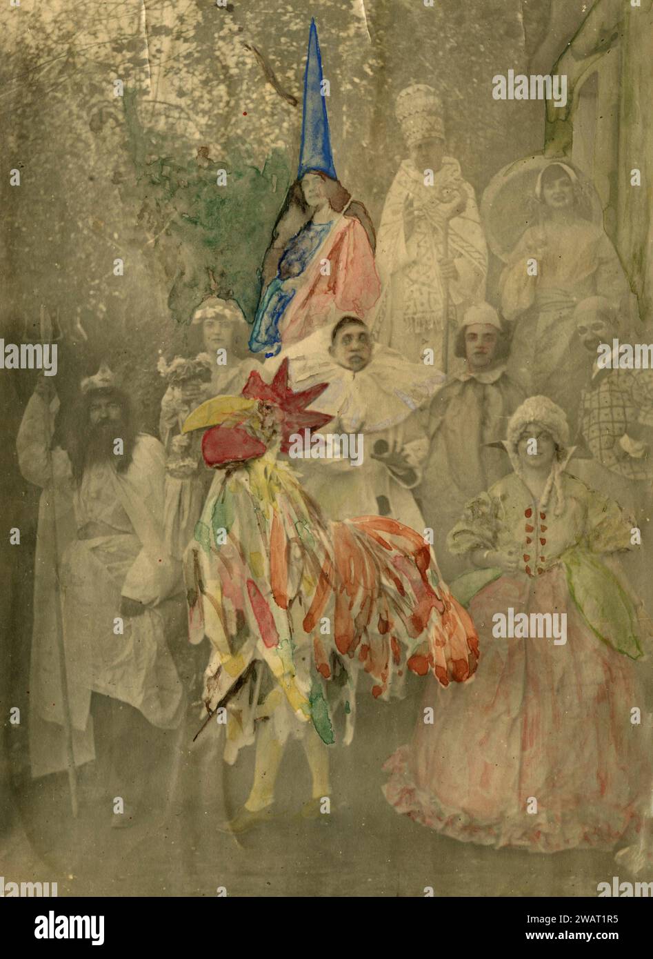 Group of people in a mask celebrating Carnival, 1900s Stock Photo - Alamy
