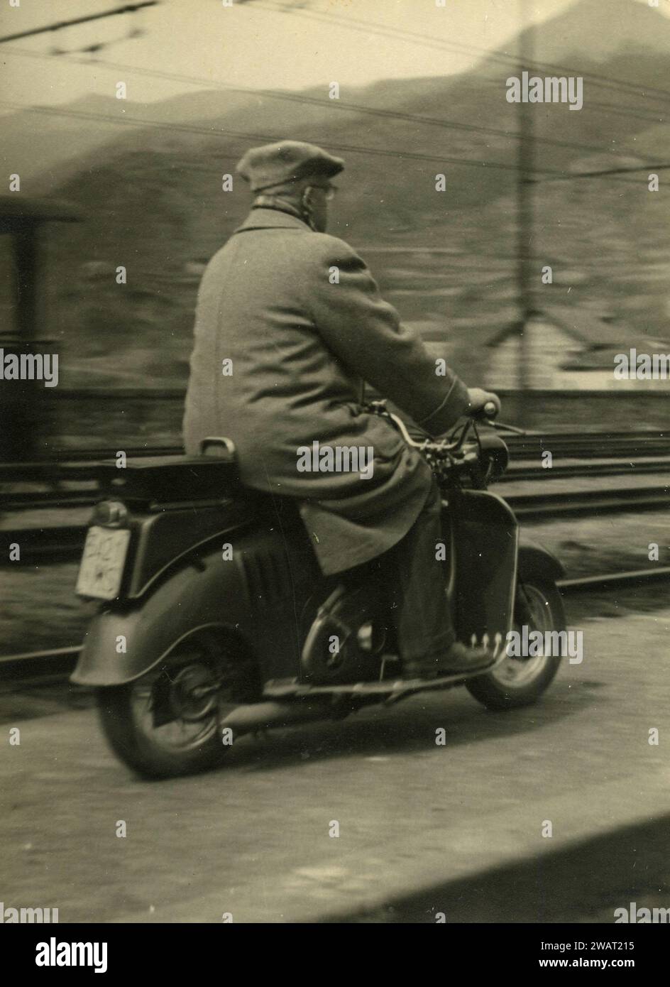Old man riding a motorcycle, Italy 1952 Stock Photo - Alamy