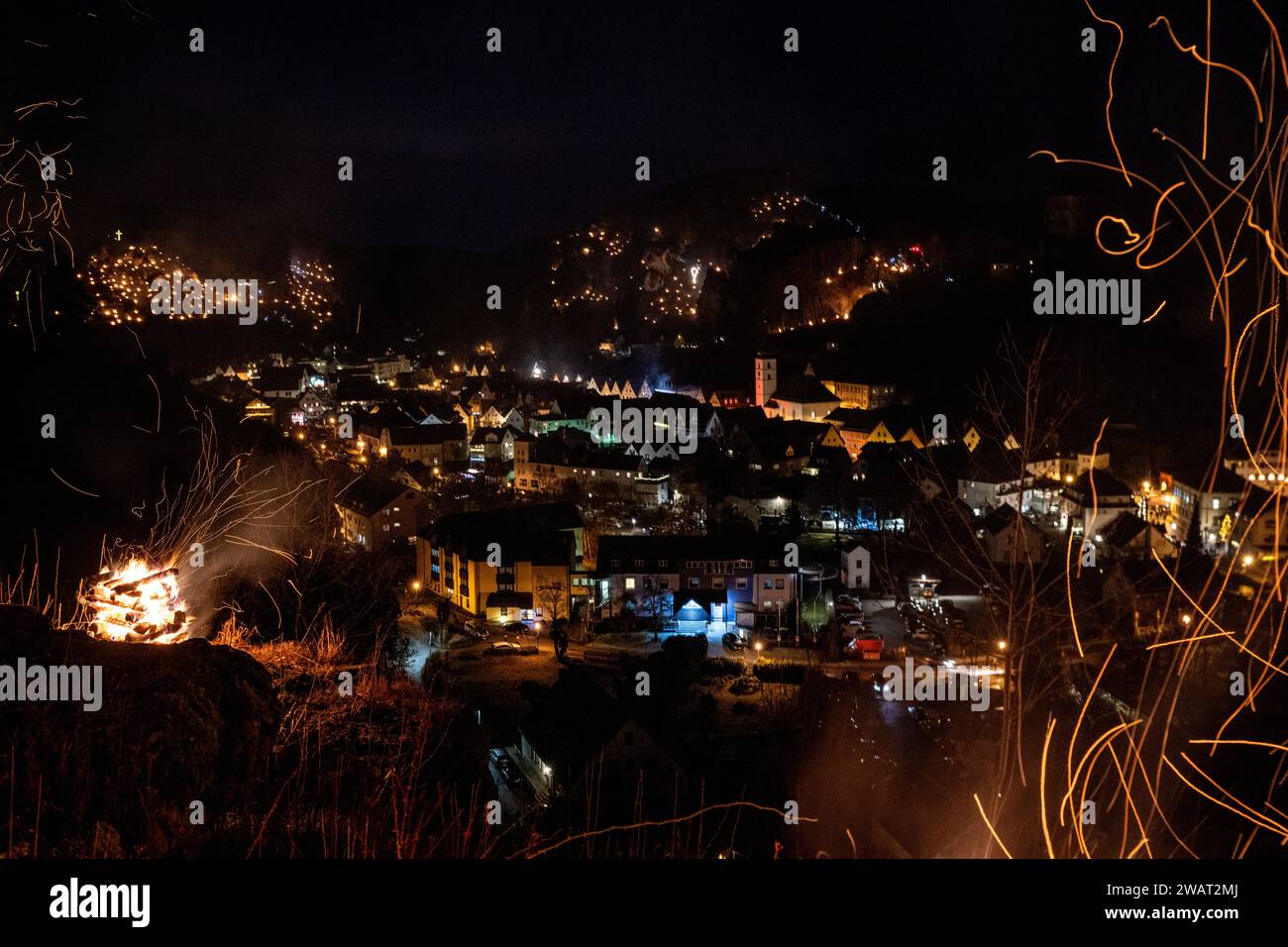 Pottenstein, Germany. 06th Jan, 2024. Numerous mountain bonfires burn ...
