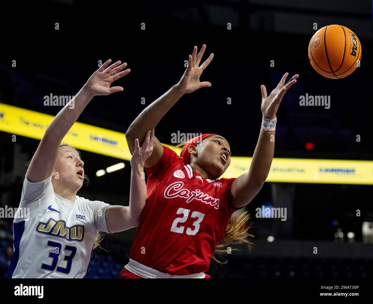 James Madison forward Steph Ouderkirk (33) and Louisiana guard Alicia ...