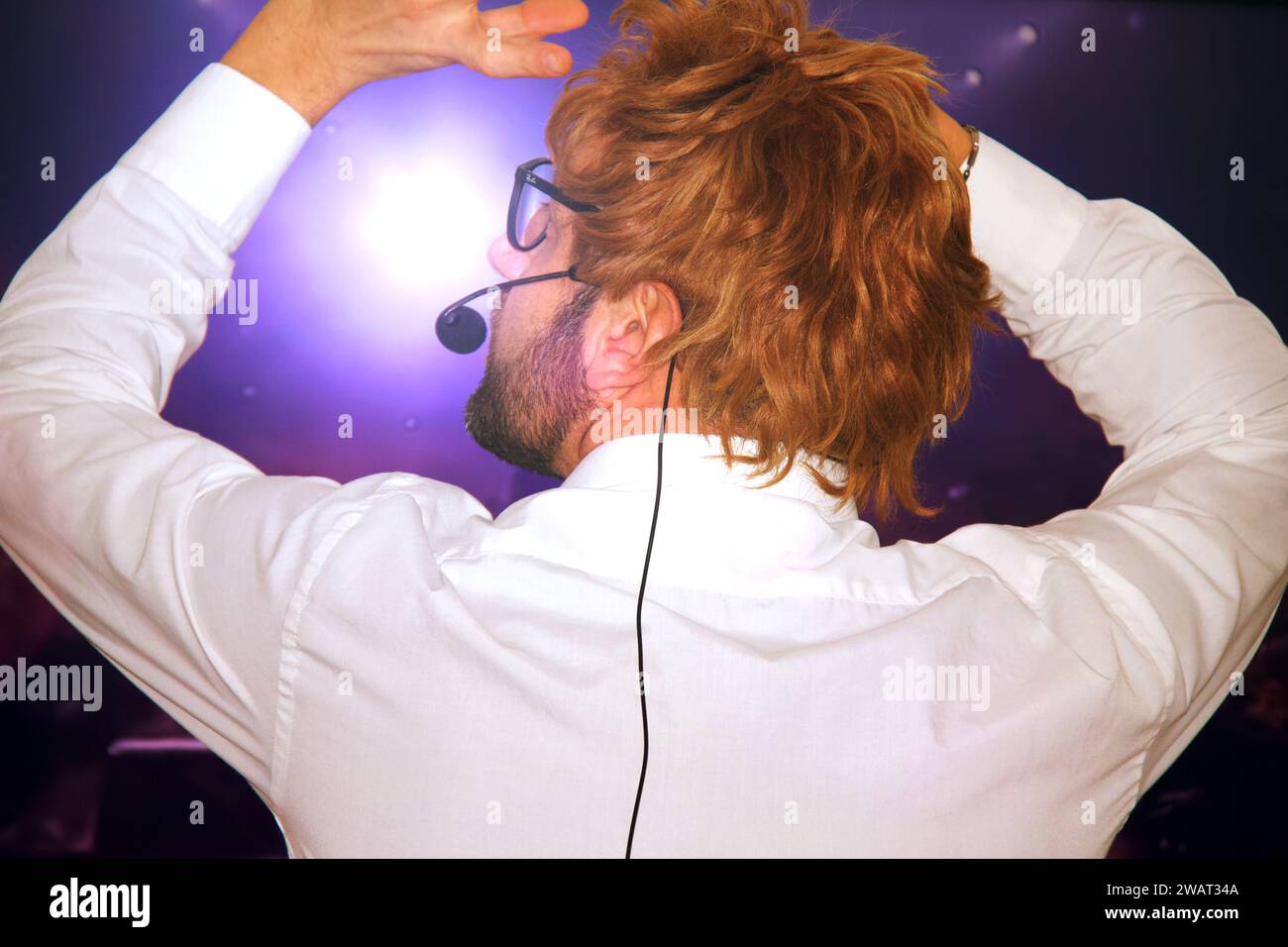 Famous Entertainer Gets on the Stage, Greets Audience, Starts ...