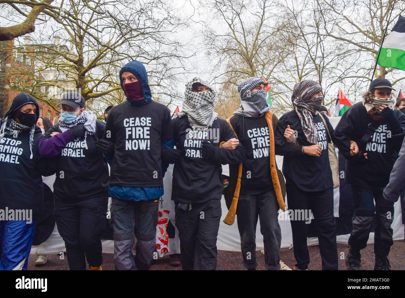 London, UK. 06th Jan, 2024. Protesters wearing shirts with the slogans ...
