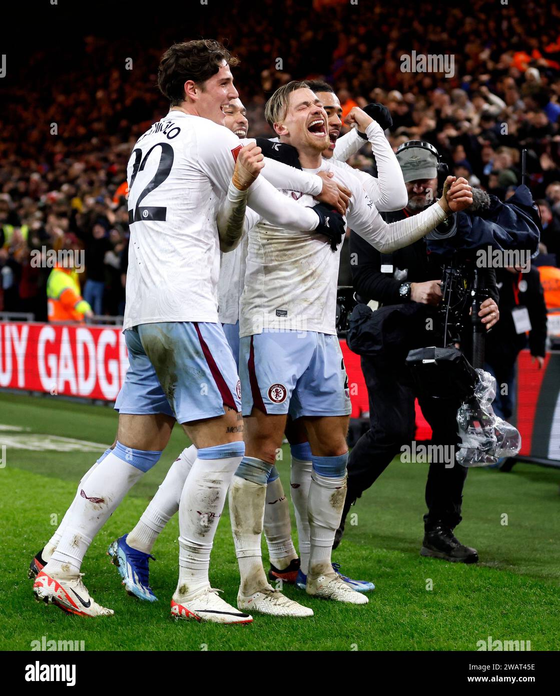 Aston Villa's Matty Cash (right) celebrates scoring their side's first ...