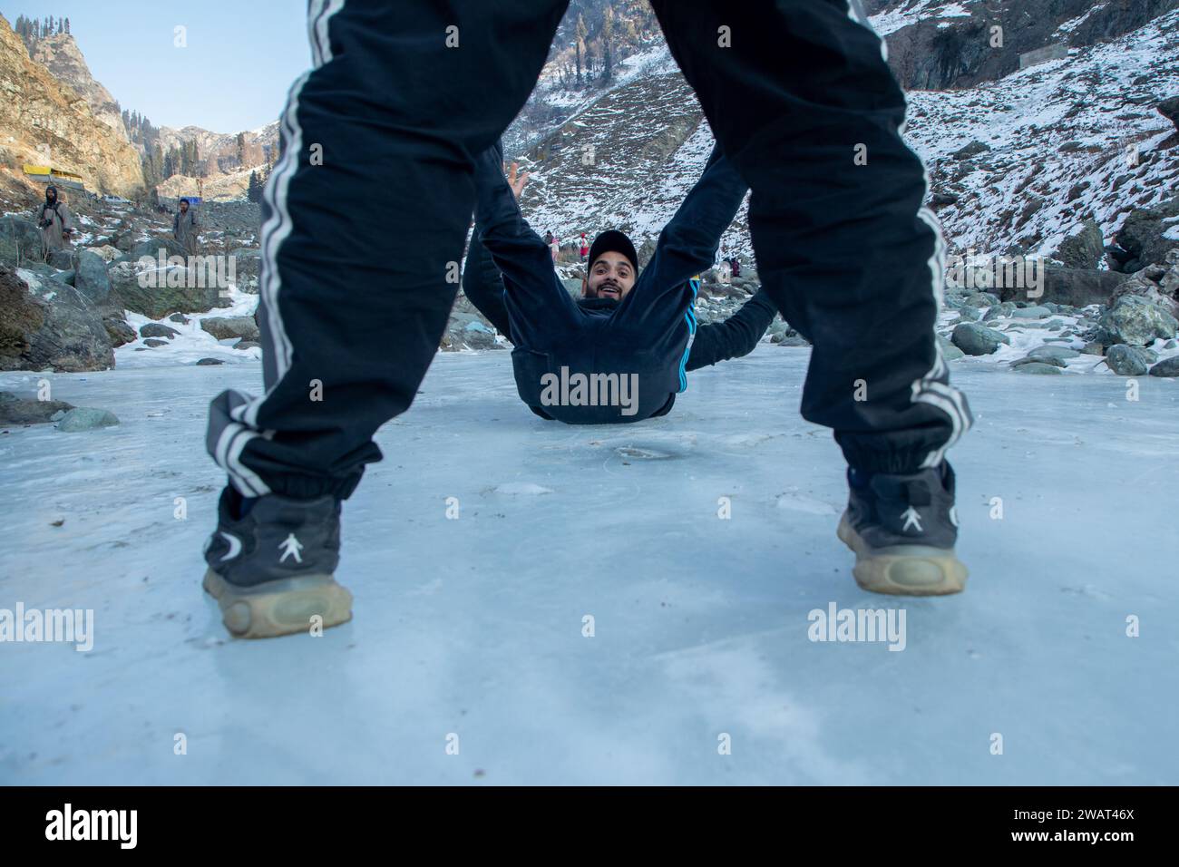 Pahalgam, India. 06th Jan, 2024. A visitor slipped and lost his balance ...