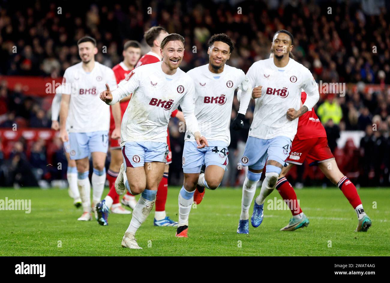 Aston Villa's Matty Cash (left) celebrates scoring their side's first ...