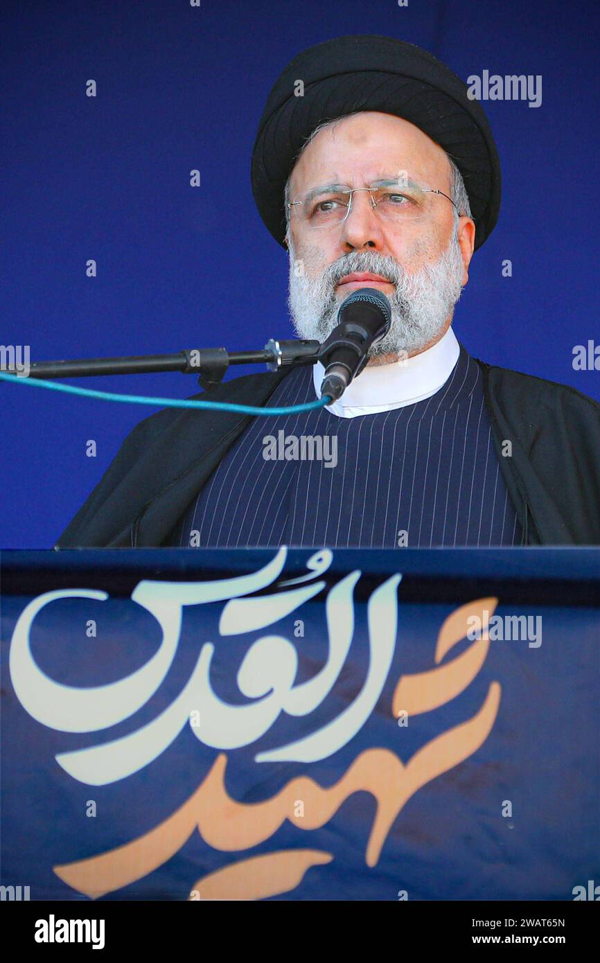 Iran s President Ebrahim Raisi speaking during the funeral of victims ...