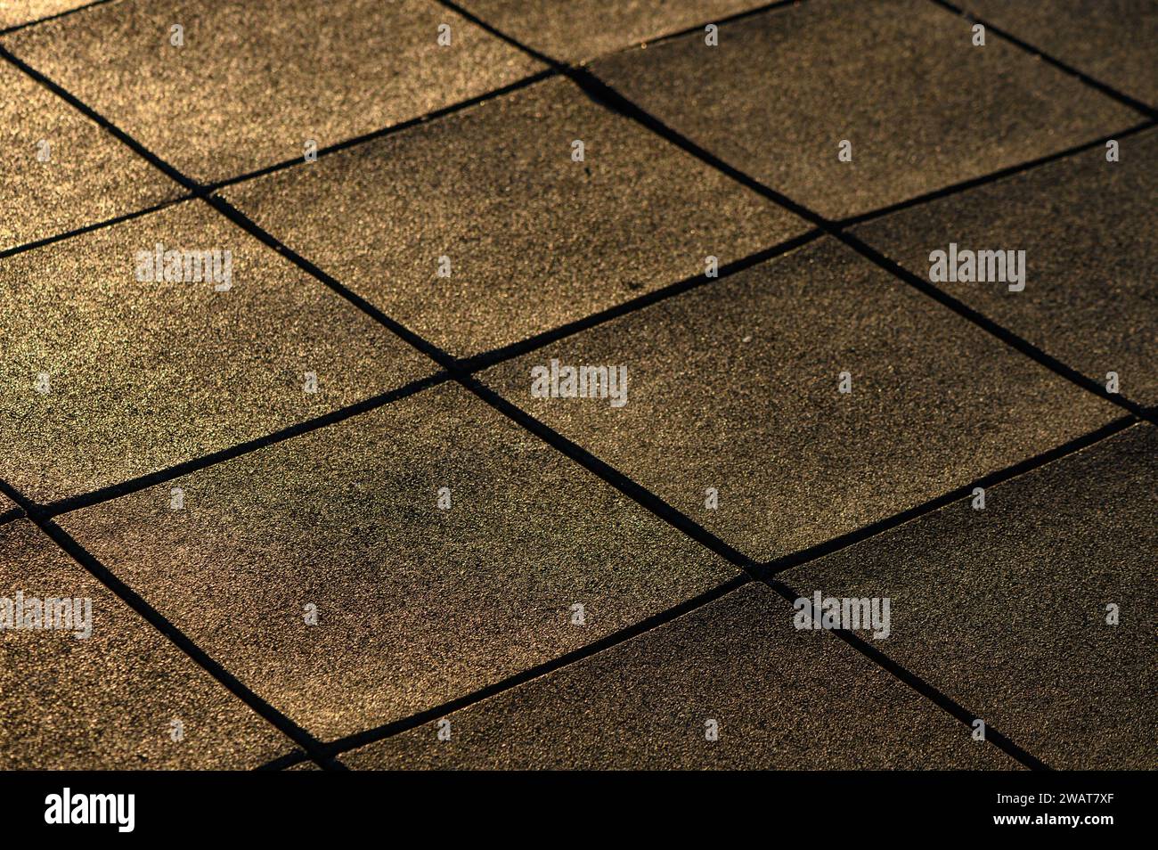 rubber soft covering with squares on the playground 3 Stock Photo - Alamy