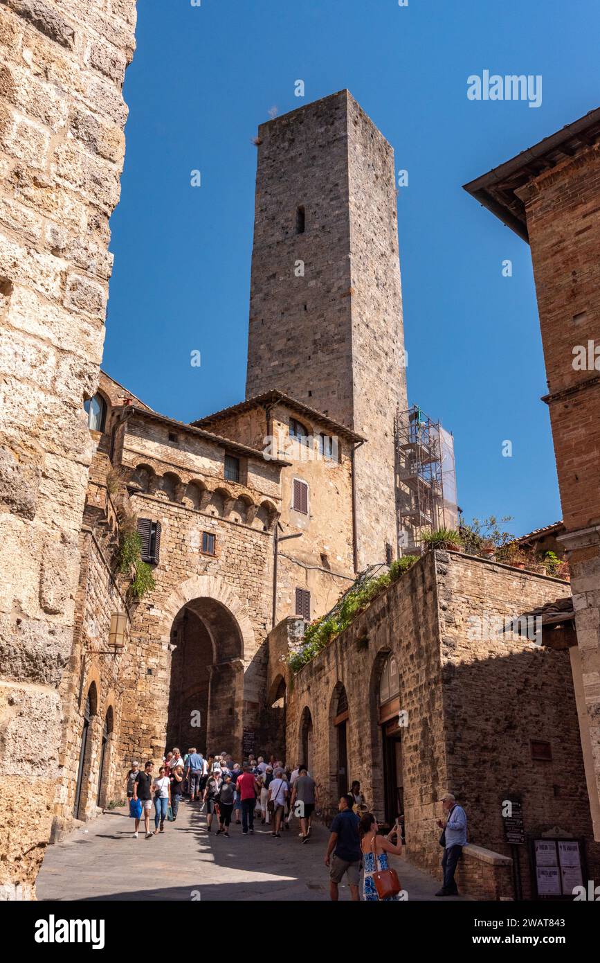 The Torre dei Becci in downtown San Gimignano, Italy Stock Photo - Alamy
