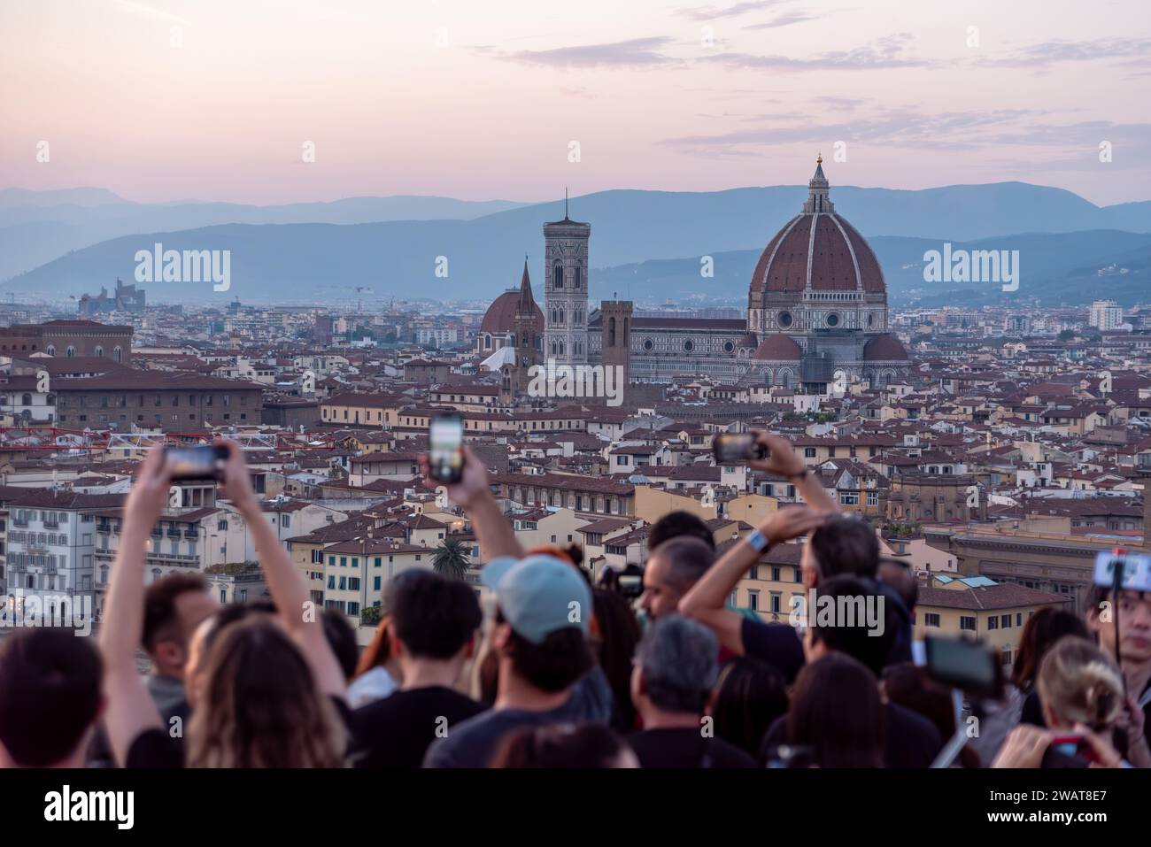 Large tourist crowd on Piazzale Michelangelo enjoying sunset over ...