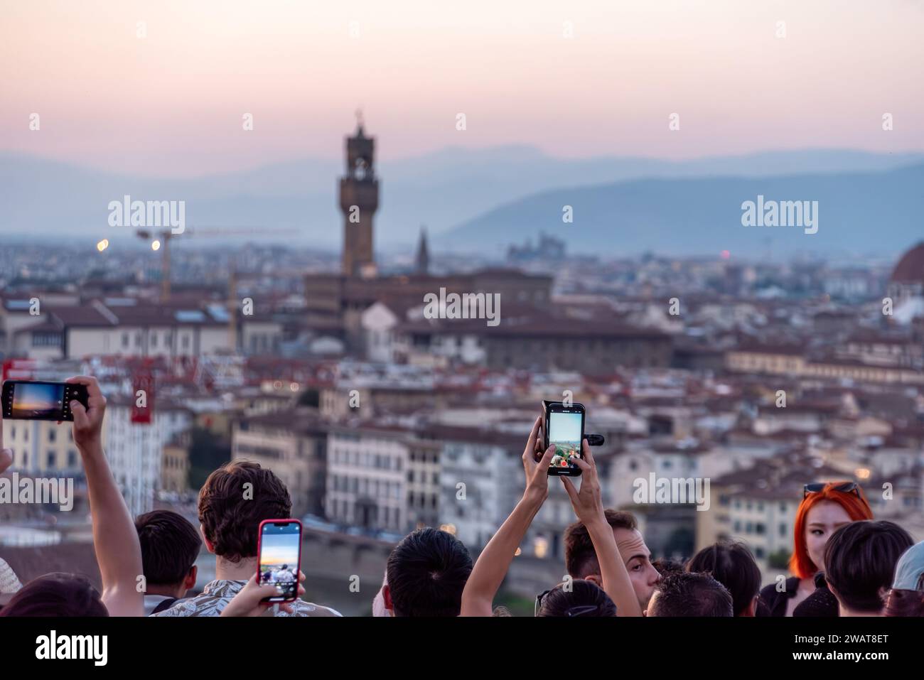Large tourist crowd on Piazzale Michelangelo enjoying sunset over ...