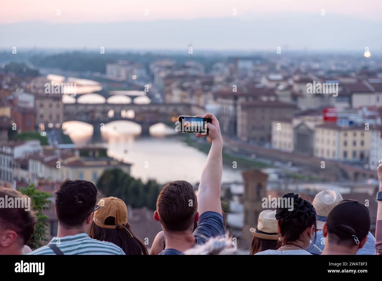 Large tourist crowd on Piazzale Michelangelo enjoying sunset over ...