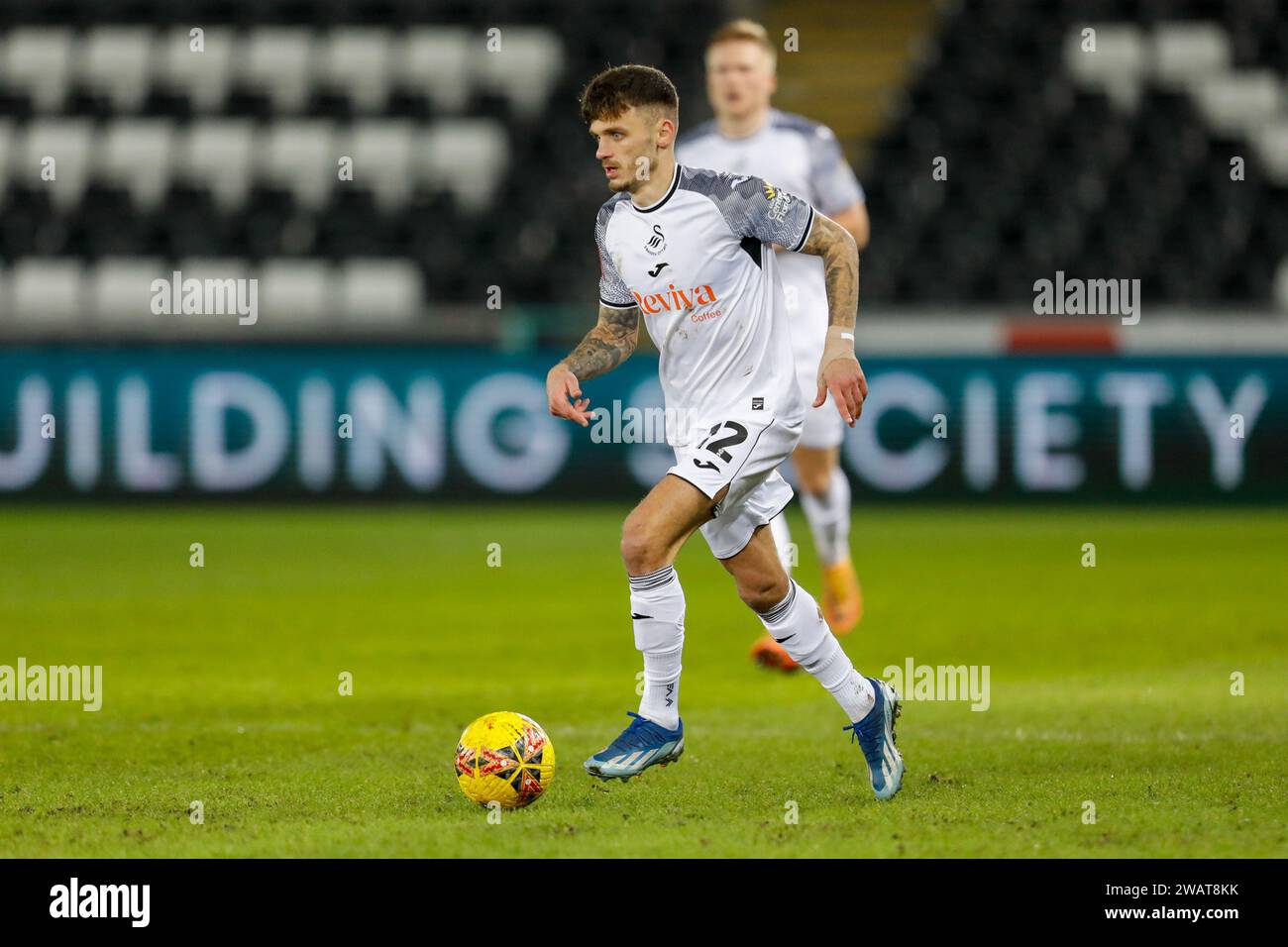 Swansea, UK. 06th Jan, 2024. Jamie Paterson of Swansea City Emirates FA ...