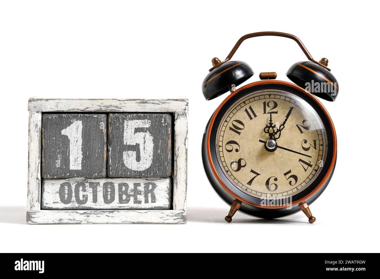 October 15 on wooden calendar with alarm clock white background Stock ...