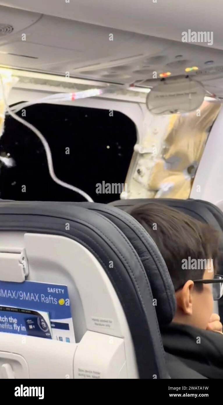 This image from video provided by Elizabeth Le shows passengers near ...