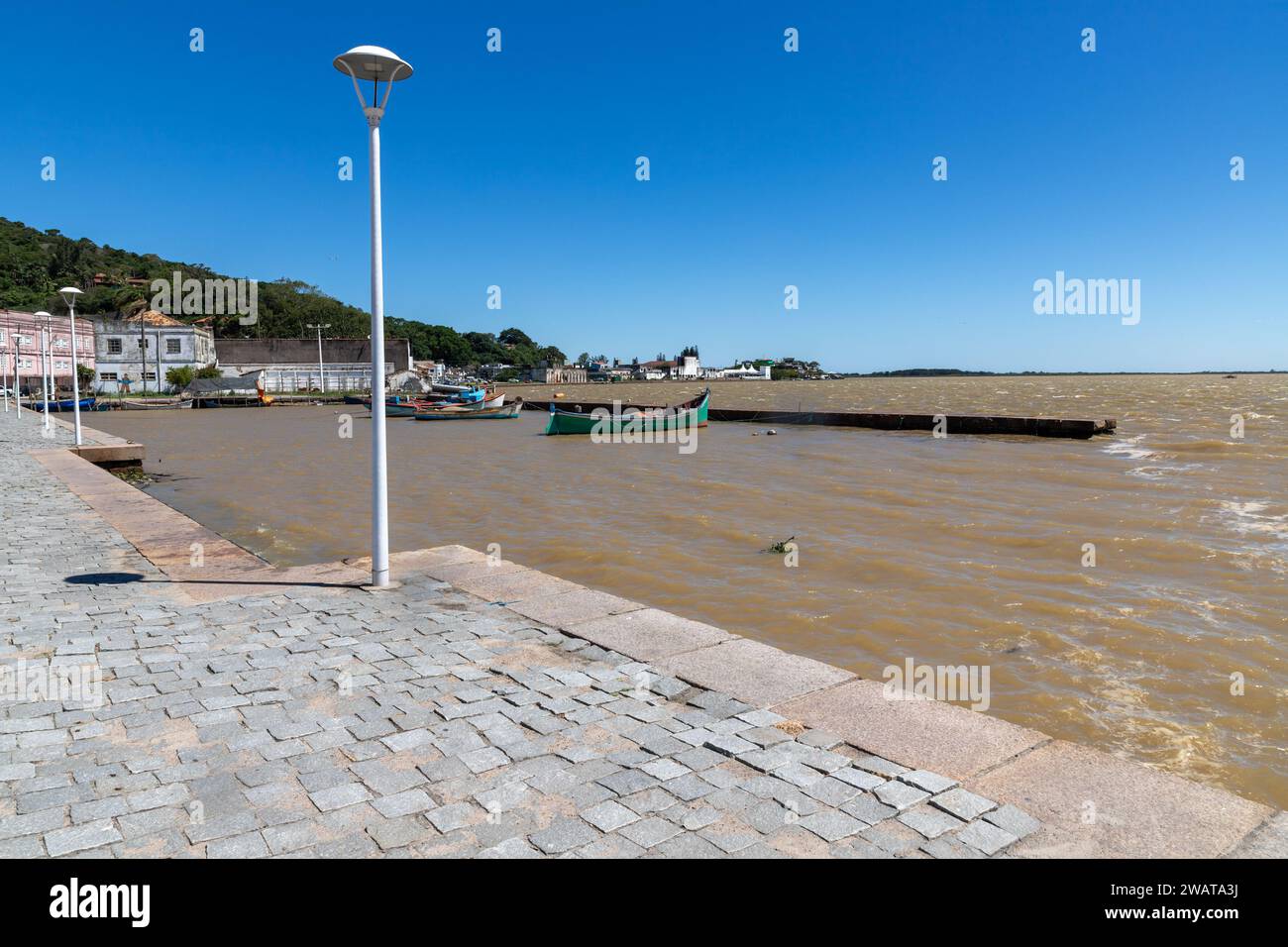 Pier with old buildings and small boats in Imarui lake, Laguna, Santa ...