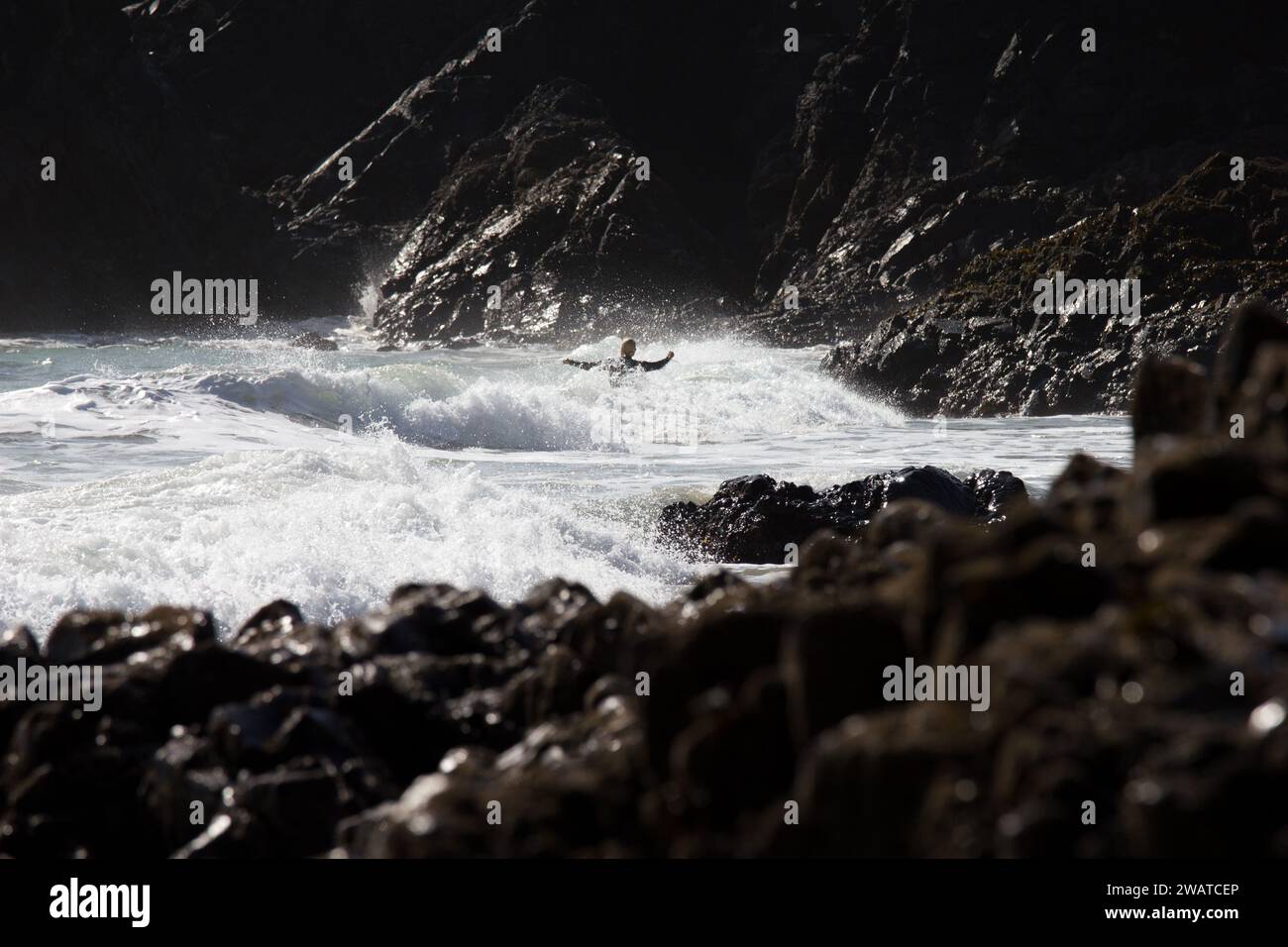 Exhilarating walking into the surf at Kynance Cove, Lizard Peninsula ...