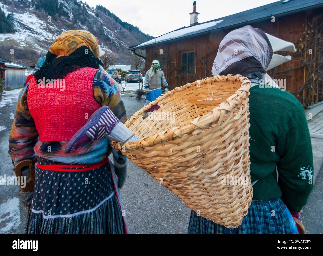 Rauris: One Schnabelpercht carries a basket on its back with children's ...