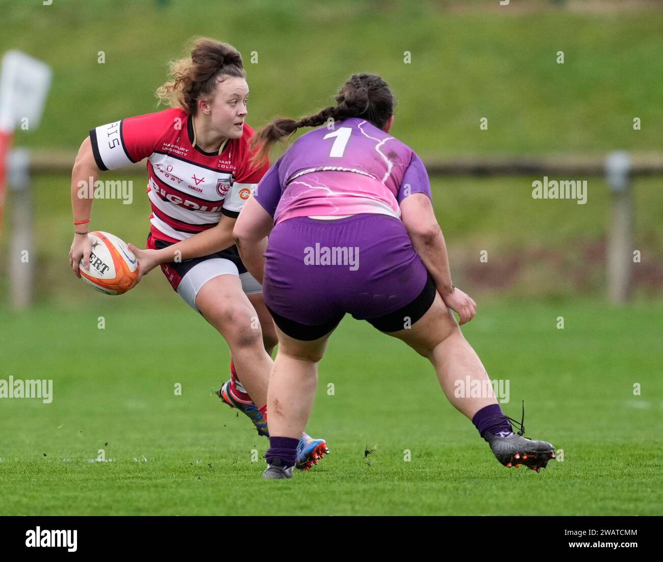 Gloucester,UK, 06 Jan 2024 Llucu George (Gloucester) (L) side steps ...