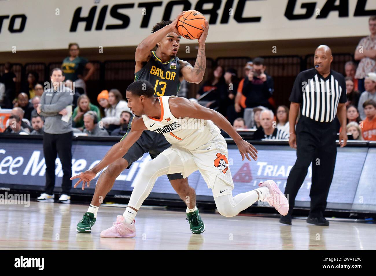 Baylor guard Langston Love (13) pulls the ball away from Oklahoma State ...