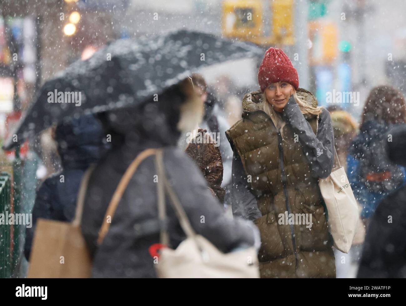 New York, United States. 06th Jan, 2024. Pedestrians bundled up and ...
