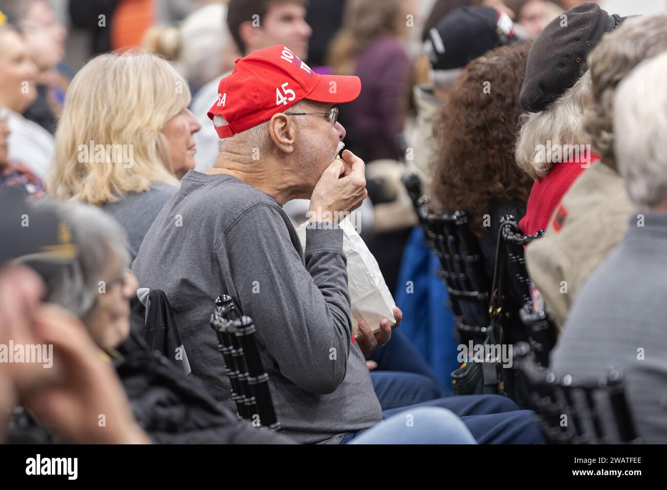 Guests eat free popcorn at a Donald Trump campaign rally held by ...