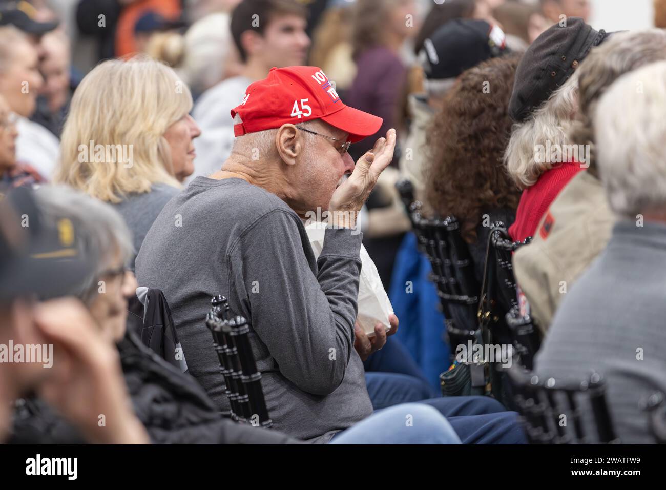 Guests eat free popcorn at a Donald Trump campaign rally held by ...