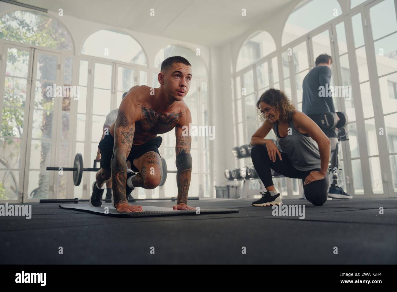 Group doing dumbbell exercises hi-res stock photography and images - Alamy