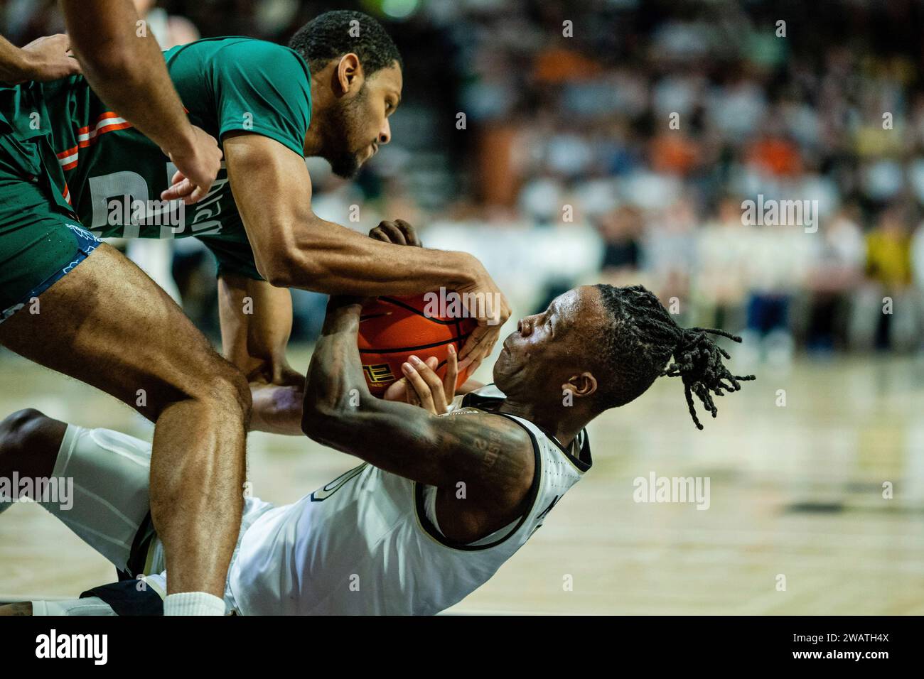 January 6, 2024: Miami (Fl) Hurricanes forward AJ Casey (23) and Wake ...