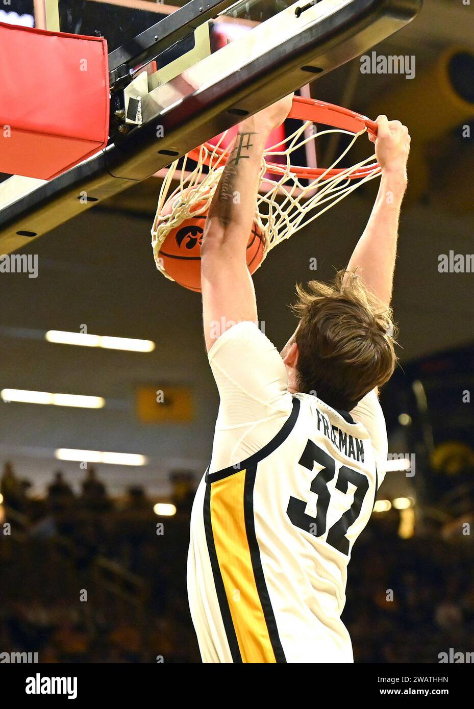 IOWA CITY, IA - JANUARY 06: Iowa forward Owen Freeman (32) dunks the ...