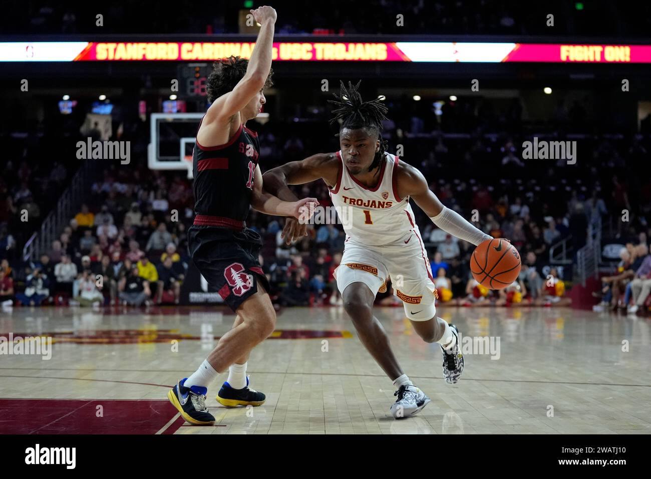 during the first half of an NCAA college basketball game in Los Angeles ...