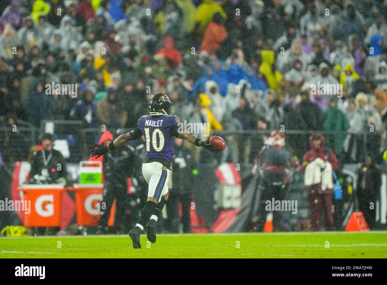 Baltimore Ravens cornerback Arthur Maulet reacts after recovering a ...