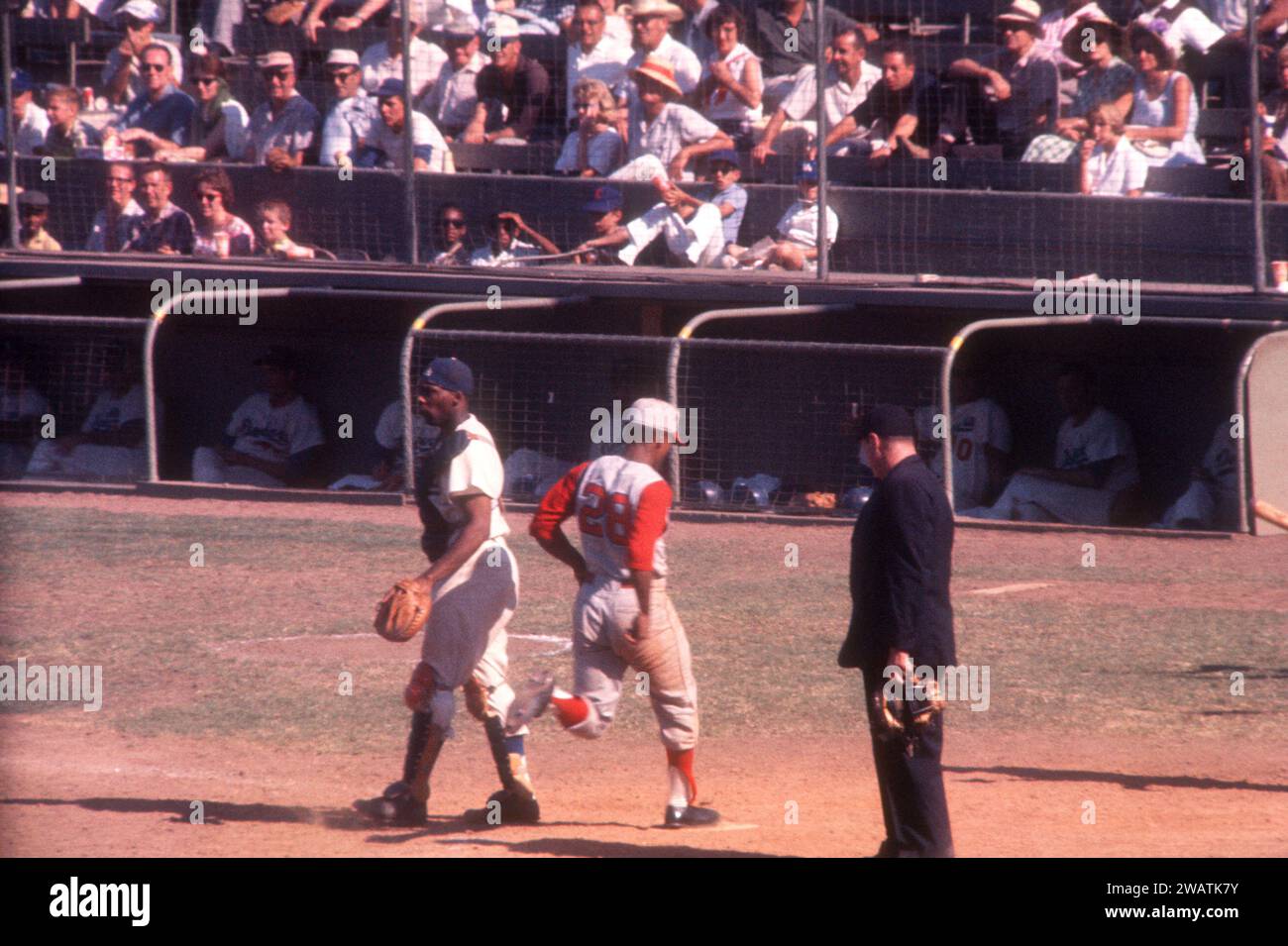 LOS ANGELES, CA - JULY 9: Vada Pinson #28 of the Cincinnati Reds scores ...
