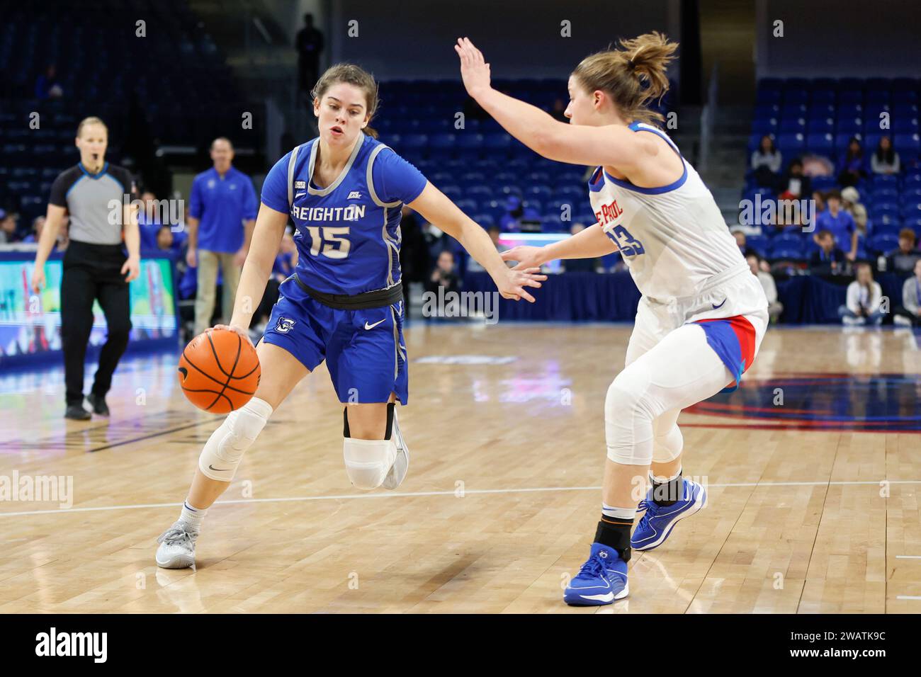 Creighton guard Lauren Jensen (15) drives to the basket against DePaul ...