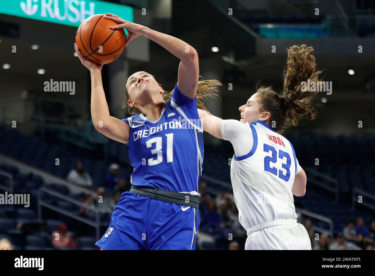 Creighton forward Emma Ronsiek (31) goes to the basket against DePaul ...
